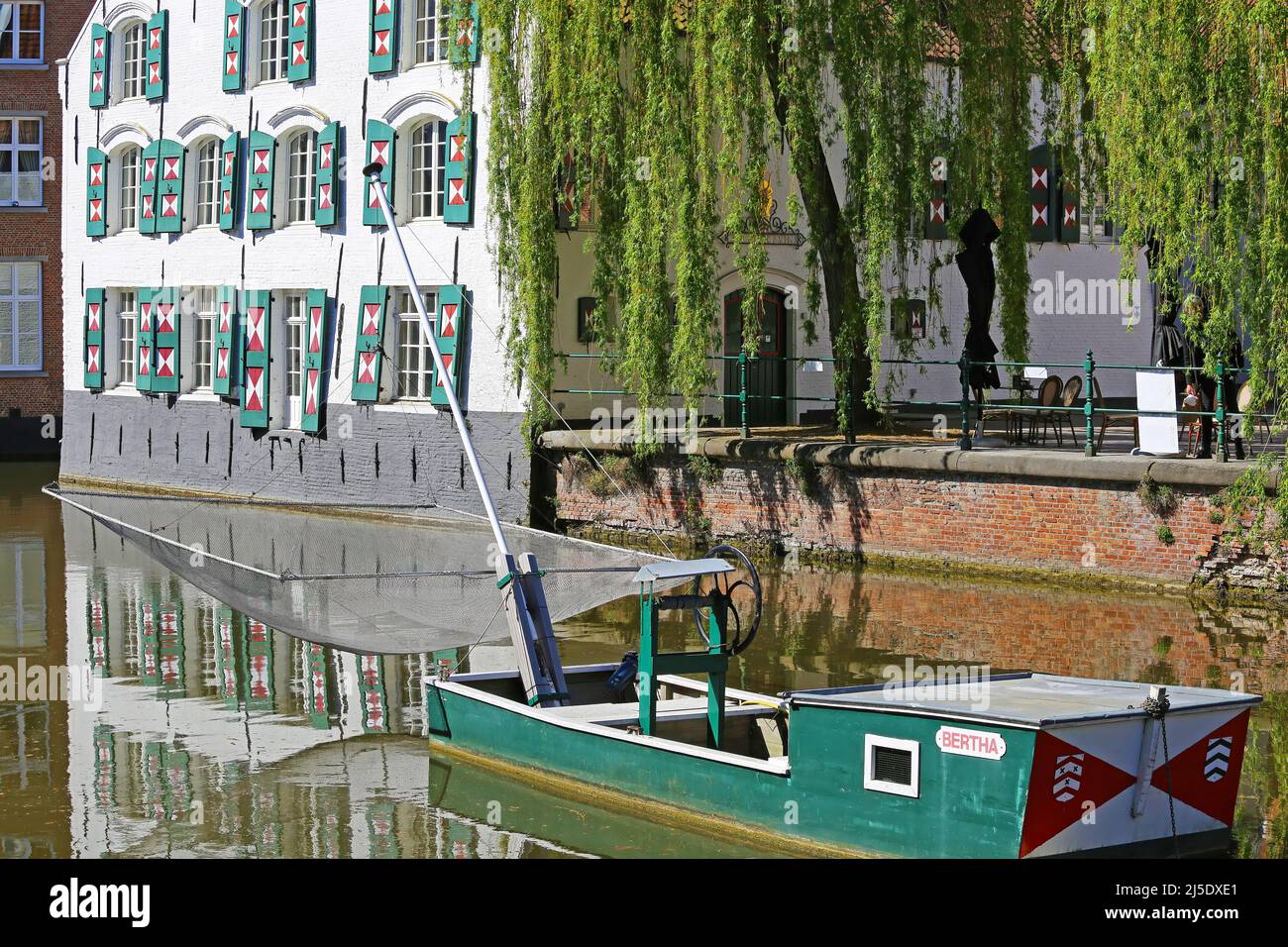 Lier, Belgium - April 9. 2022: View on water moat with old traditional ...