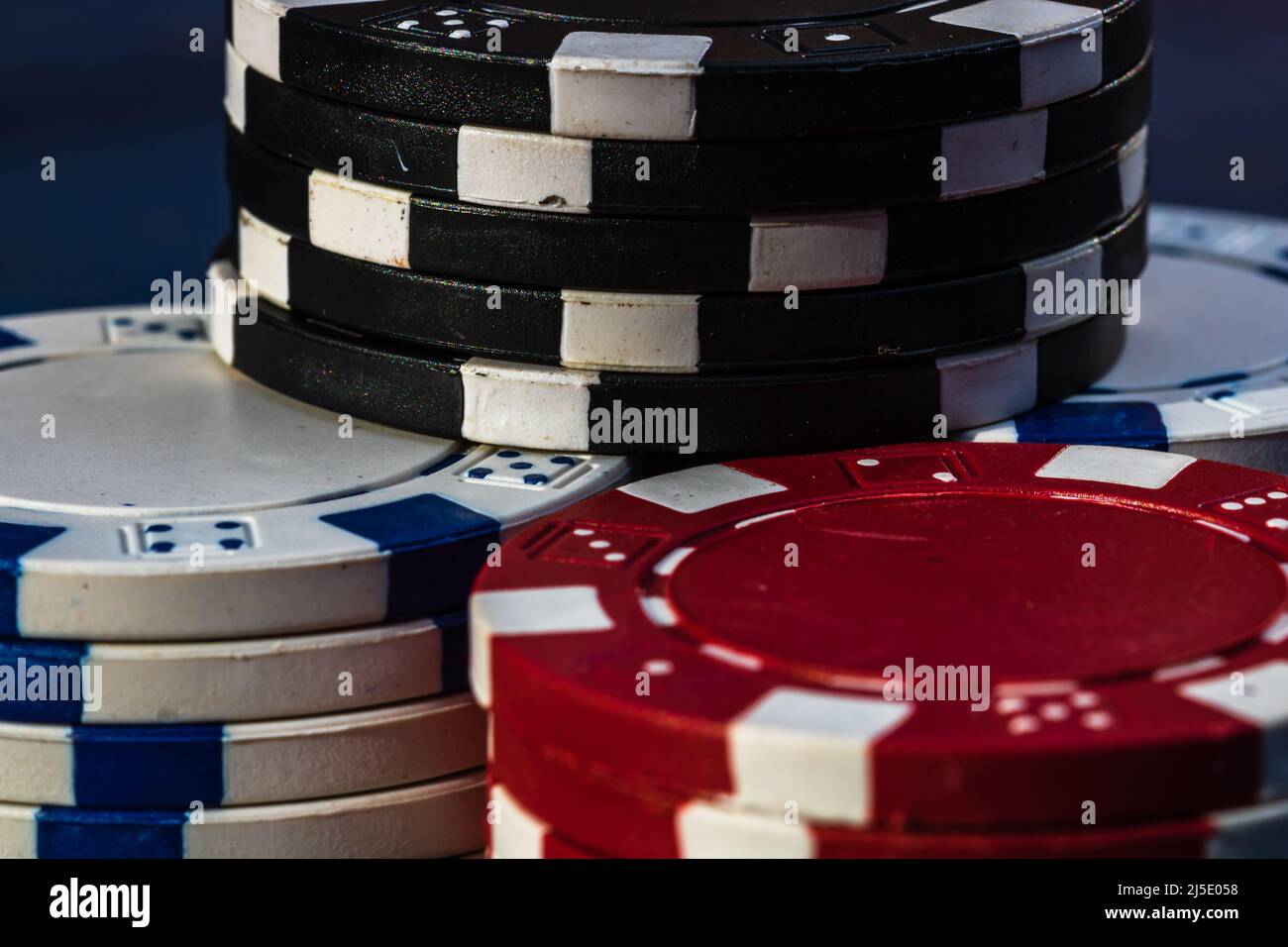Stacks of poker chips detail with cards Stock Photo - Alamy