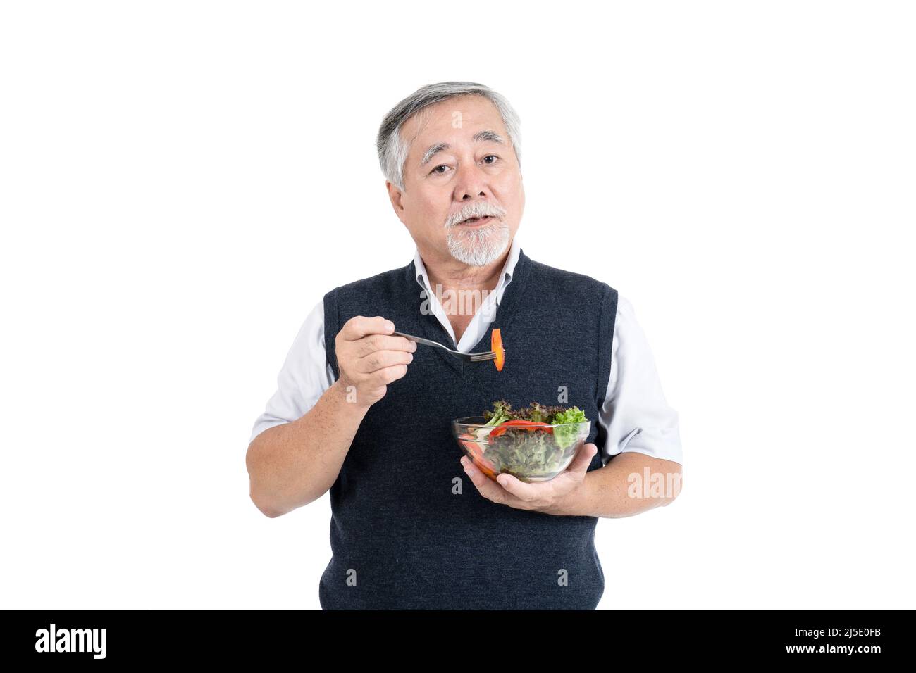healthy elderly man eating a salad, Senior male health care eat ...