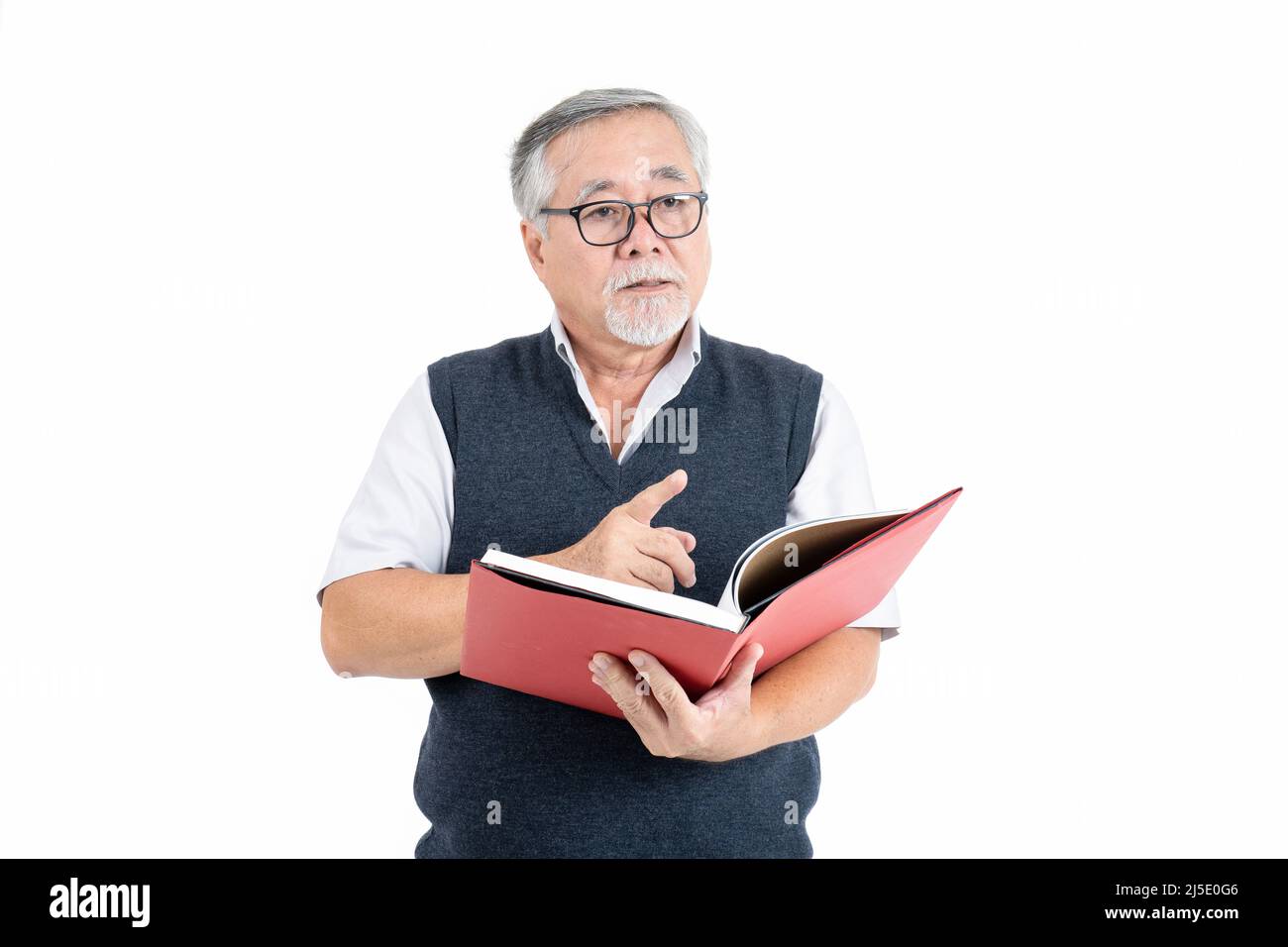 Adult Mature old man wearing eyeglasses thinking and reading book with ...