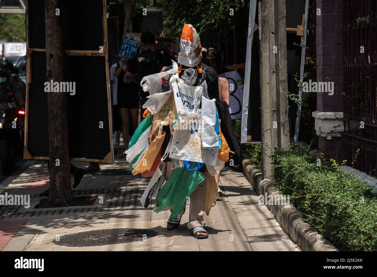 Bangkok, Thailand. 22nd Apr, 2022. An activist dressed with plastic ...
