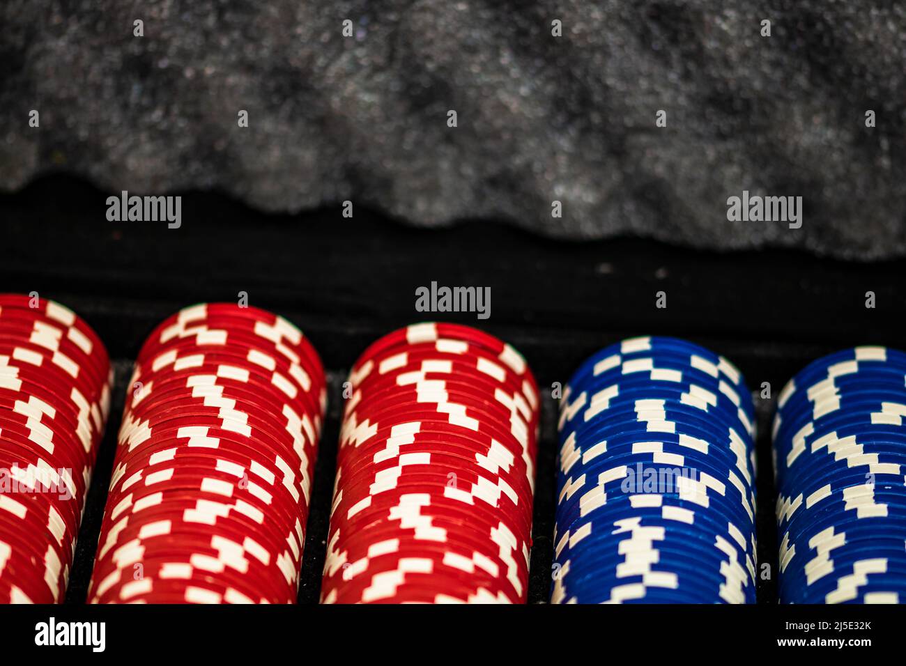 Stacks of poker chips detail with cards Stock Photo - Alamy