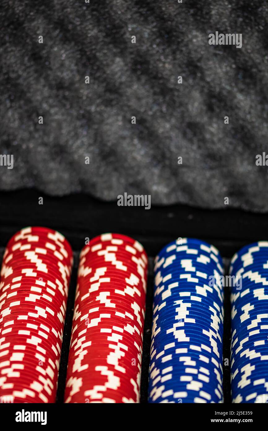Stacks of poker chips detail with cards Stock Photo - Alamy