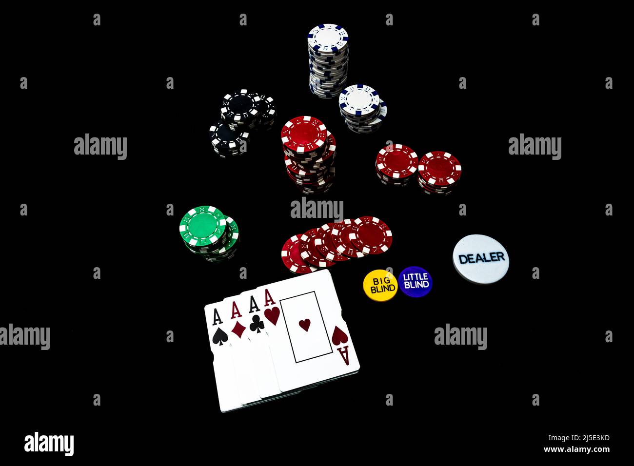 Stack of poker chips and poker cards on black background Stock Photo ...