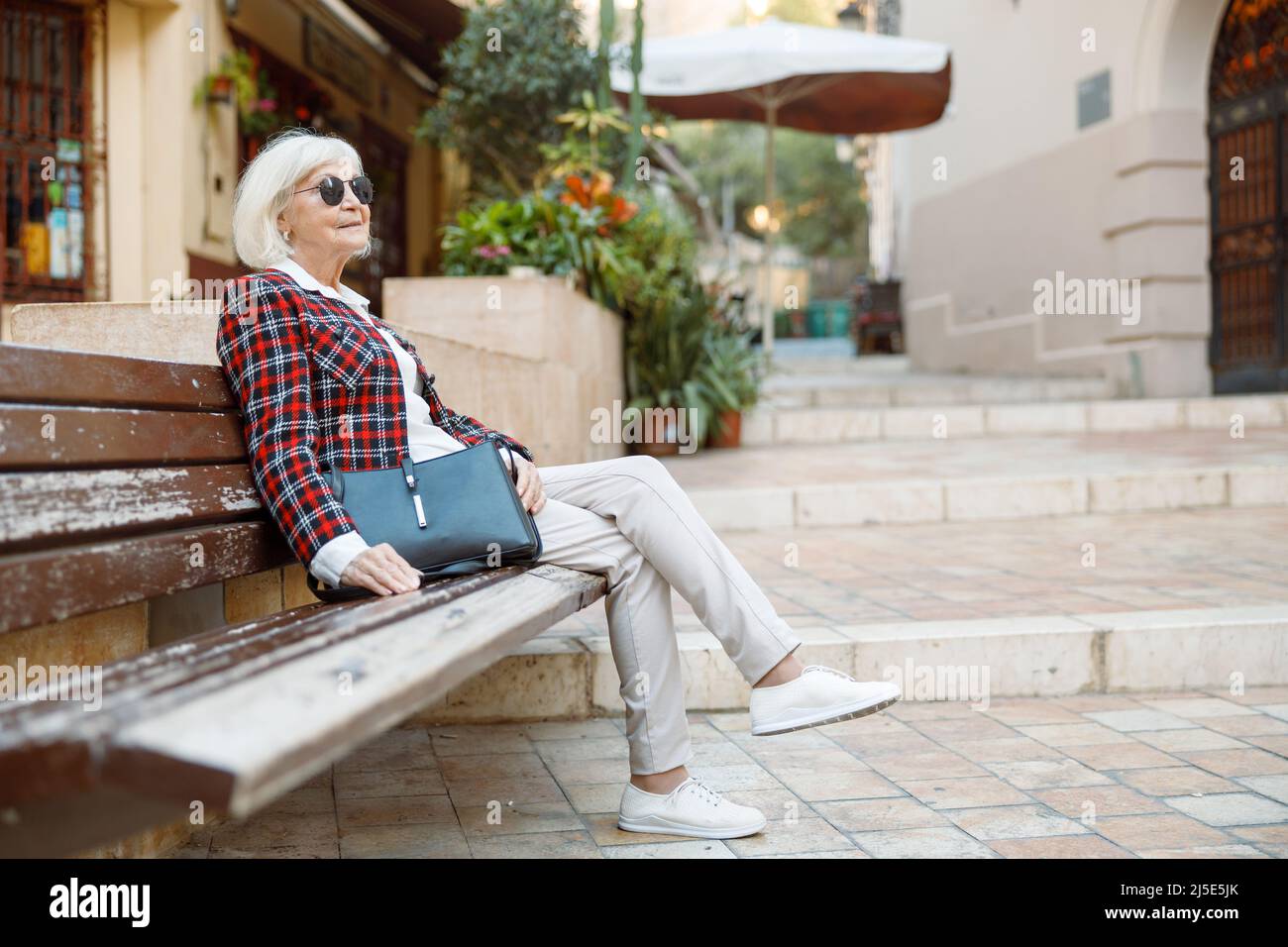 Elegant older woman in hi-res stock photography and images - Alamy