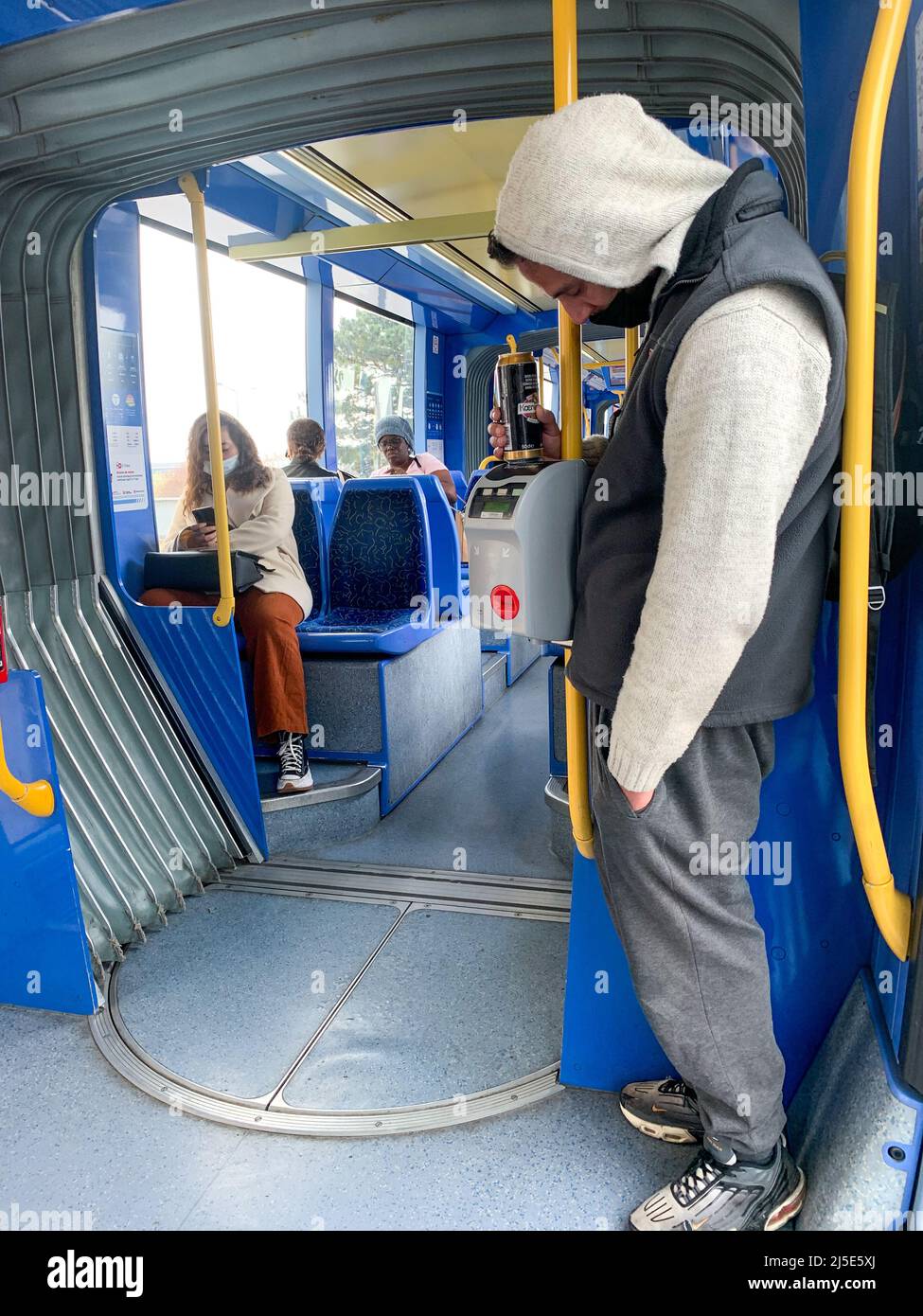 Drunk man standing in a tram train, Lyon, France Stock Photo - Alamy