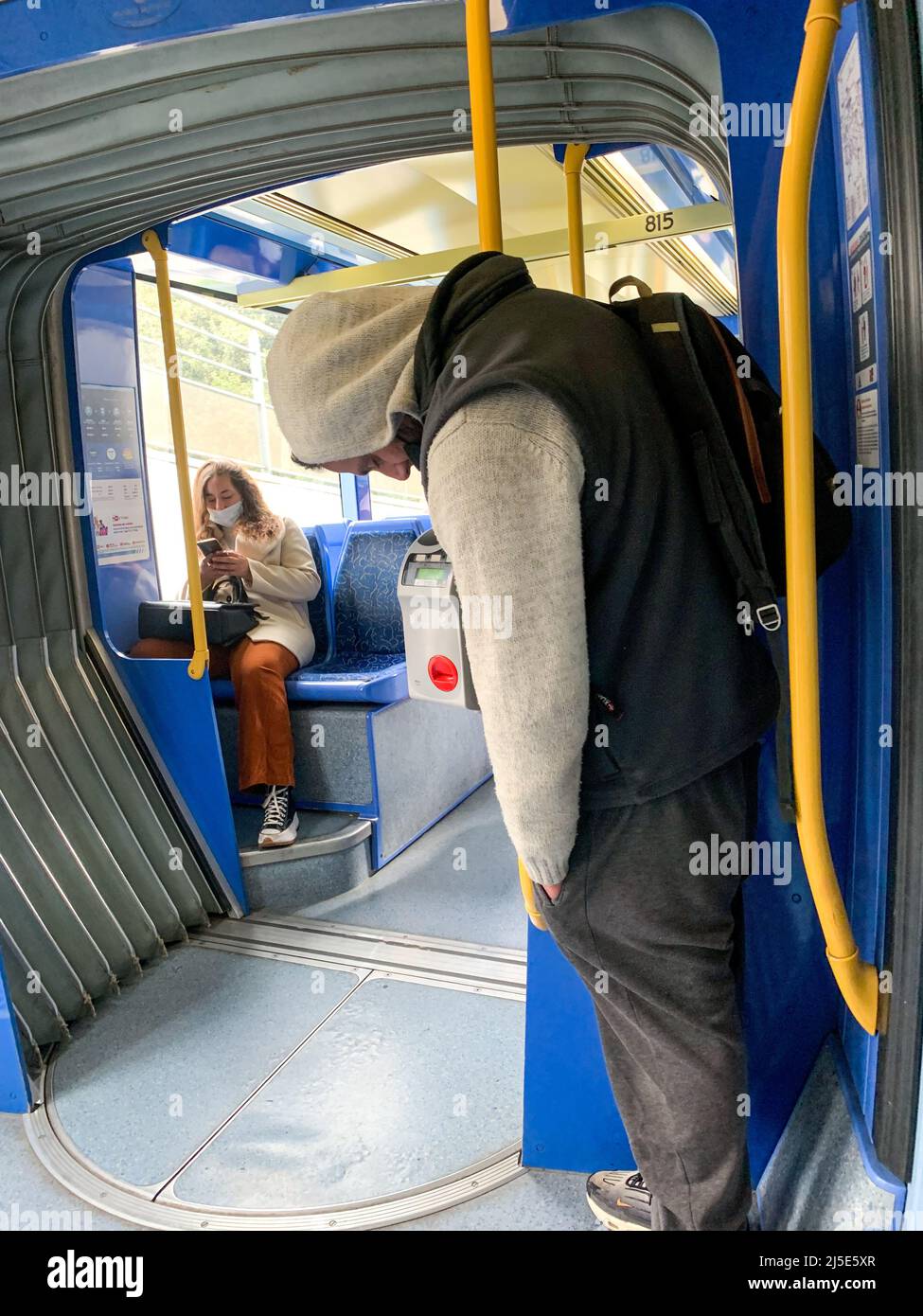 Drunk man standing in a tram train, Lyon, France Stock Photo - Alamy