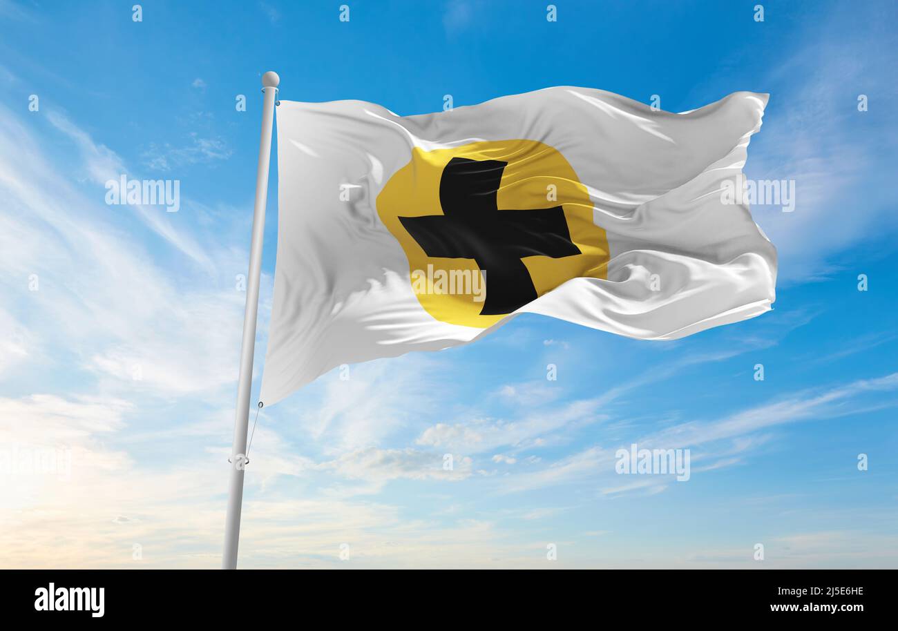 official flag of Het Vlaamse Kruis, Belgium at cloudy sky background on ...