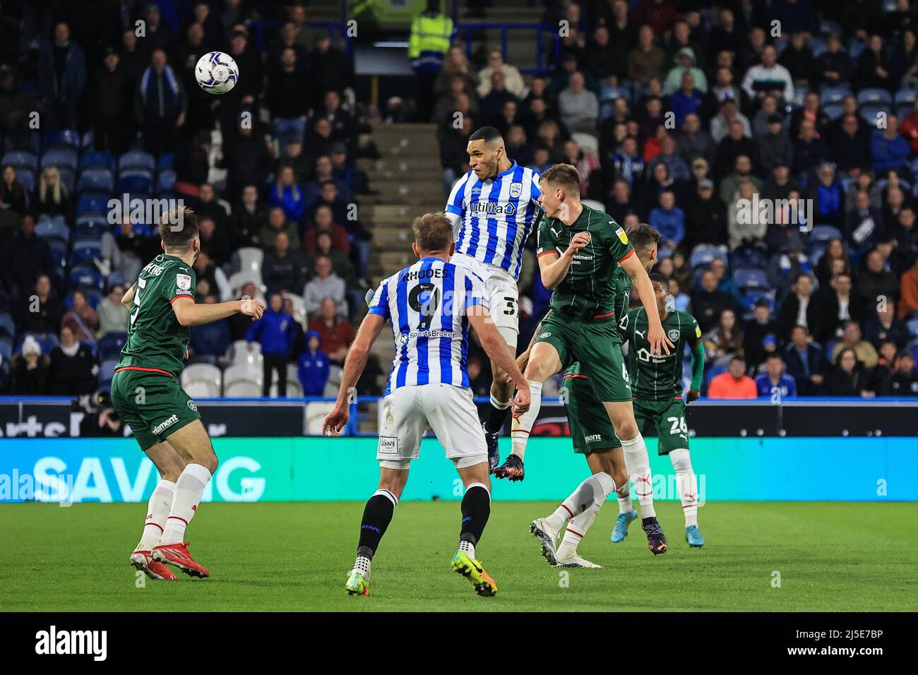 Jon Russell #37 of Huddersfield Town heads on goal, saved by Jack ...