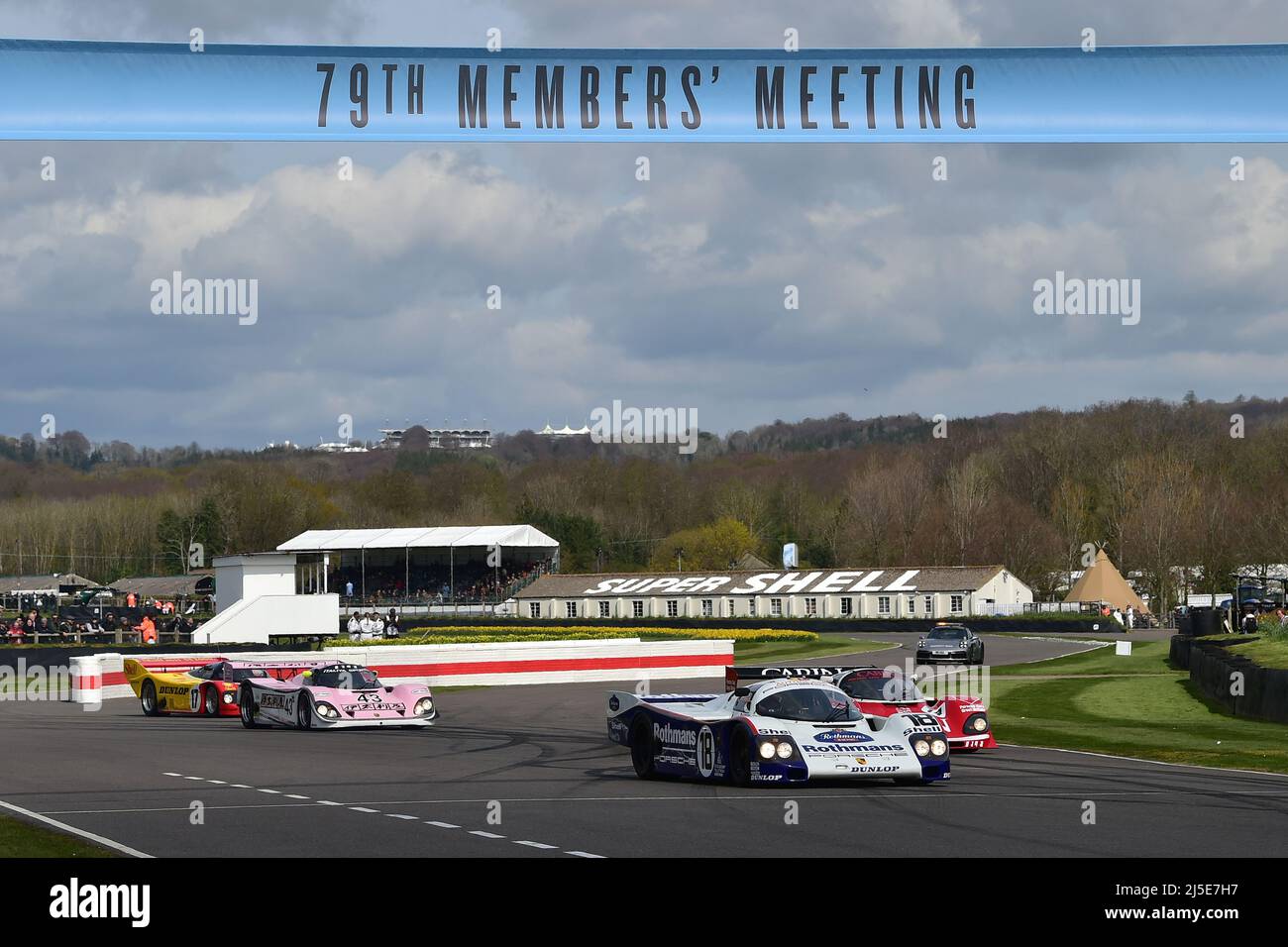 Through the chicane and with the horse race course on the hill behind ...