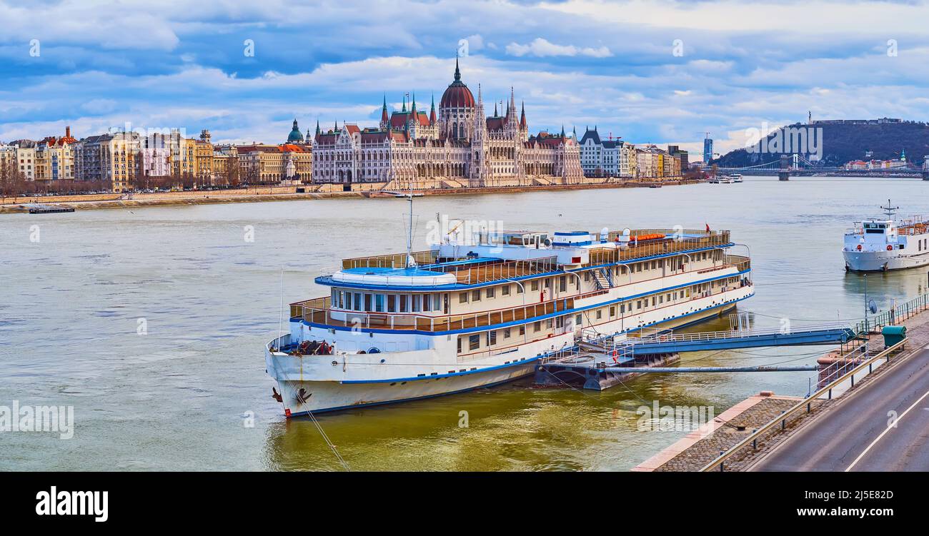 The ships are moored at the bank of Danube River with a view of the ...