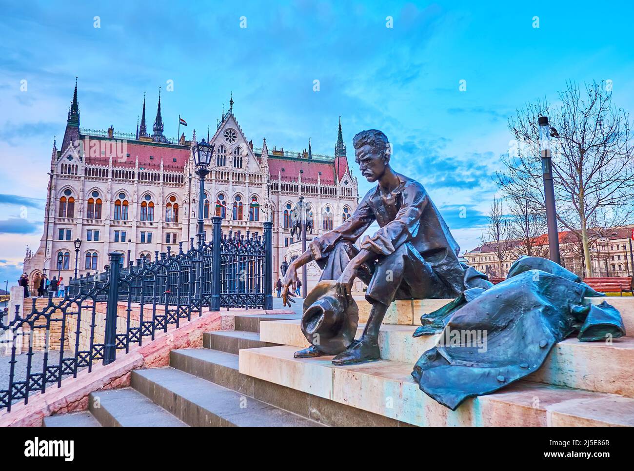 The statue of Jozsef Attila, sitting on the stairs at the Hungarian ...