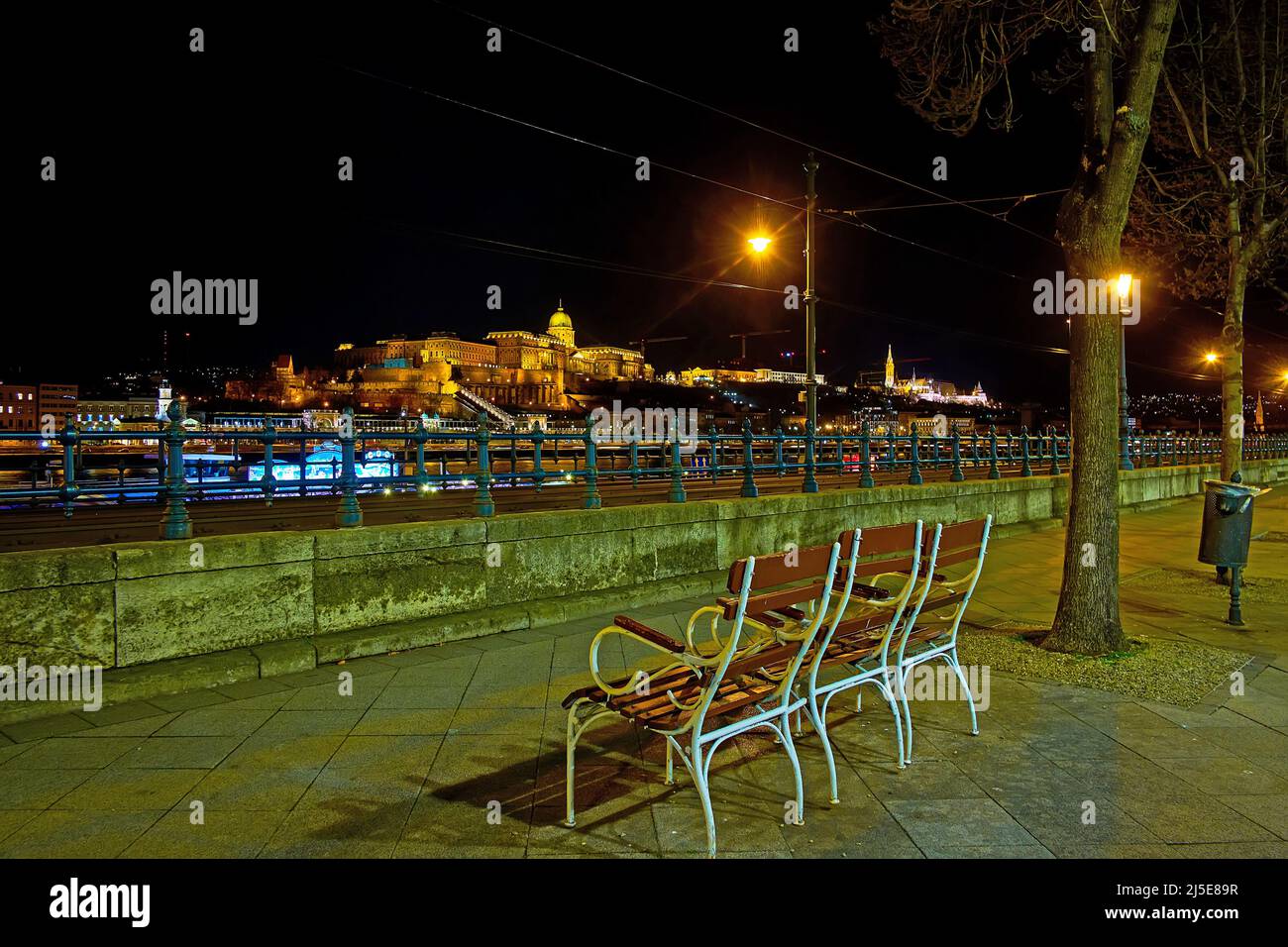The evening embankment of Pest District with a view of historic Buda ...