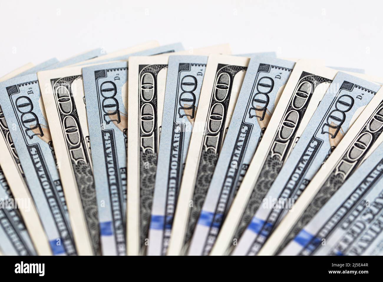 Fan of US 100 dollar banknotes for design purpose Stock Photo - Alamy