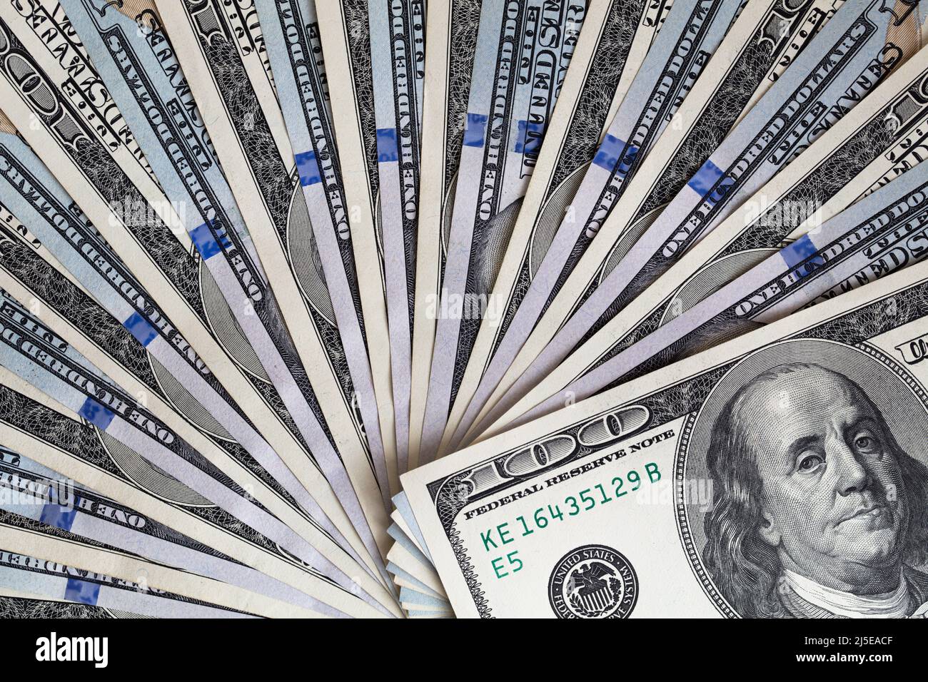 Fan of US 100 dollar banknotes for design purpose Stock Photo - Alamy