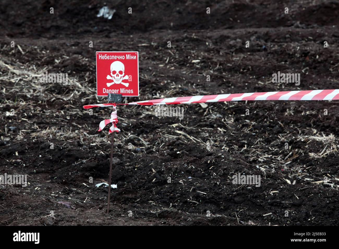 KYIV REGION, UKRAINE - APRIL 21, 2022 - The 'Danger Mines' warning sign ...