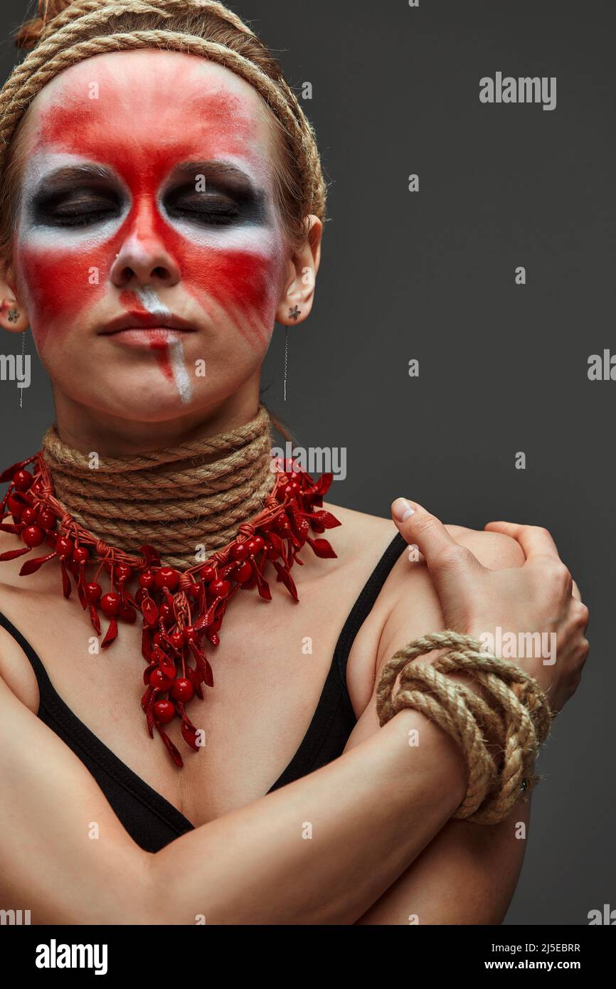 close up portrait of young beautiful girl with colorful face painting ...