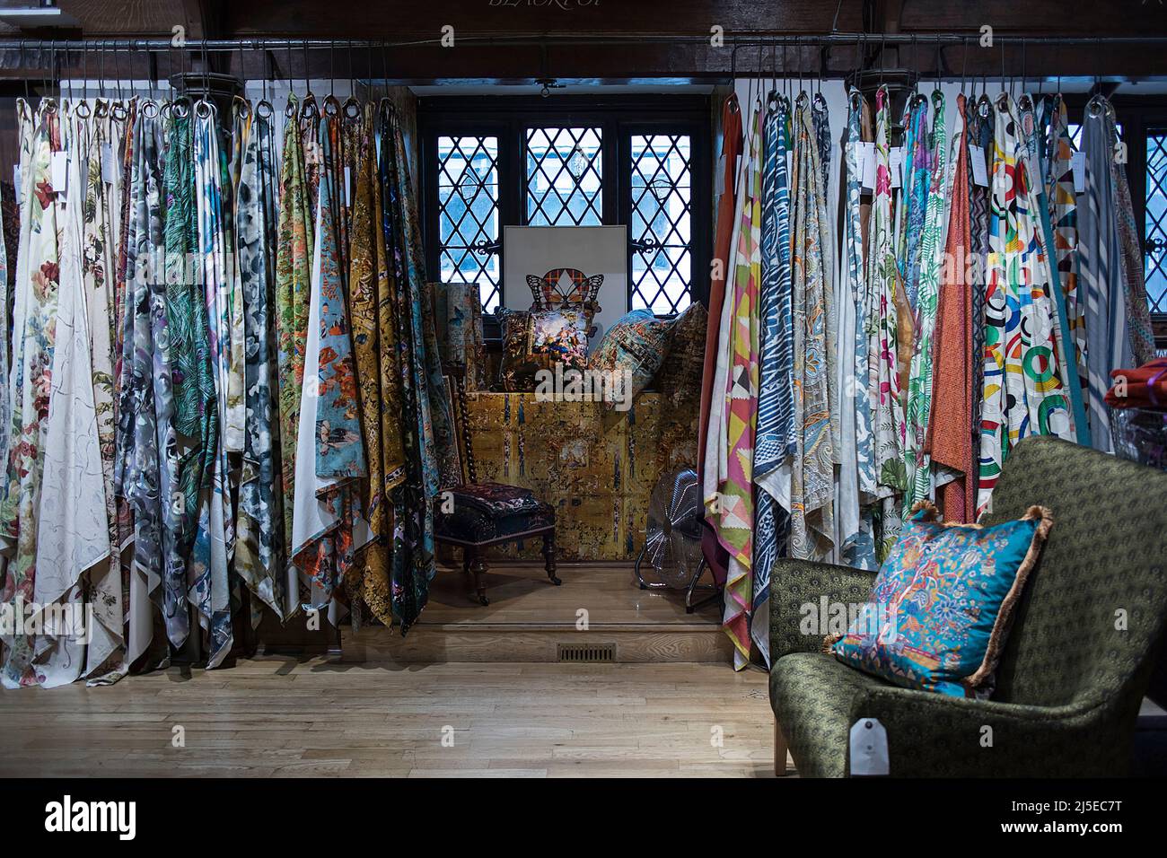 LONDON, UK - December 22, 2020: Fabric department interior with window and patchwork work ...