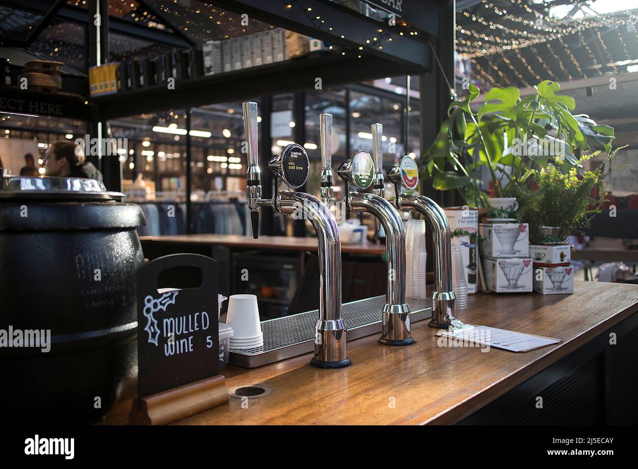 London, UK - 20 April 2022, A stall with taps for beer and mulled wine ...