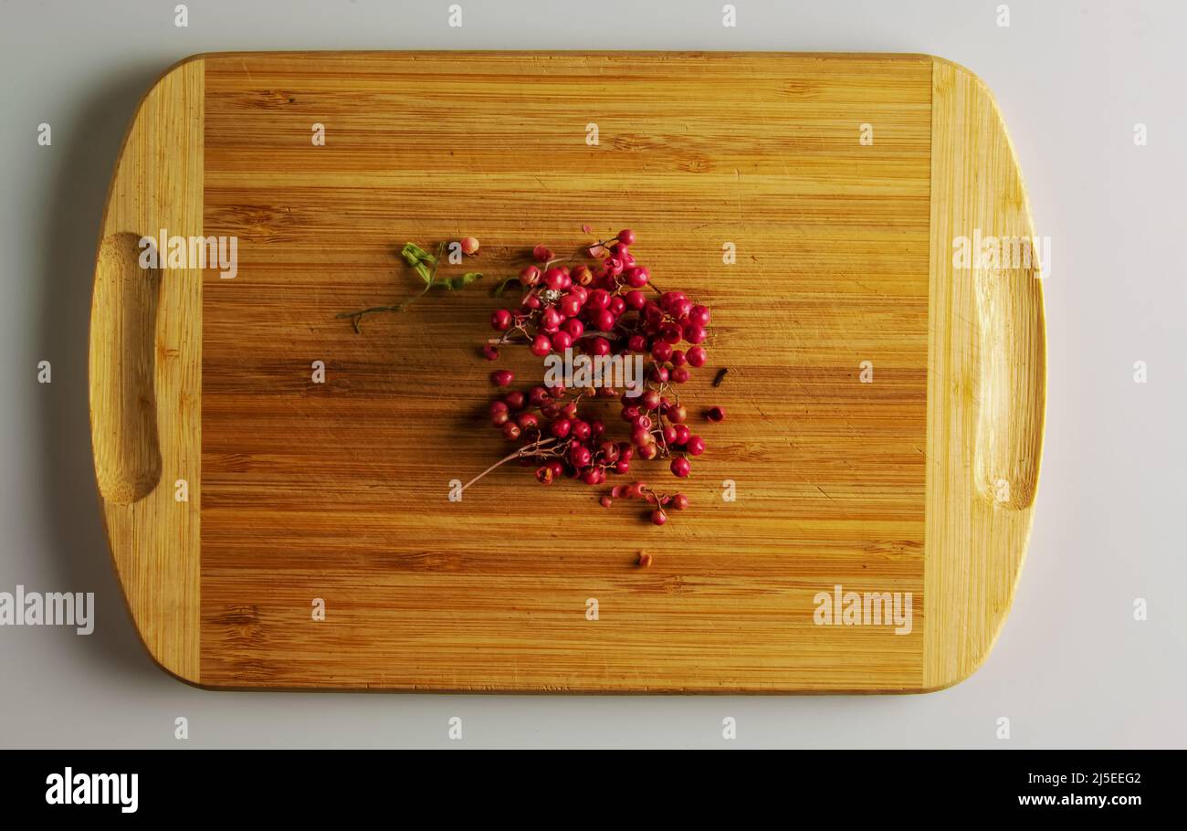 Pink peppercorns. Aromatic spice for food. Background of dried pink ...
