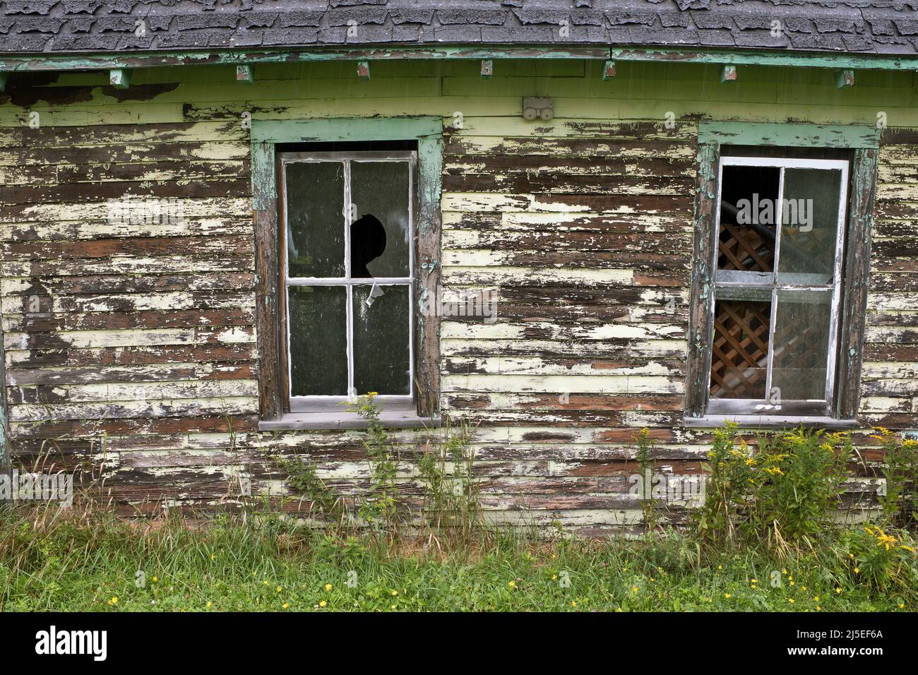 Old Barn with Two Broken Windows and Peeling Paint Stock Photo - Alamy