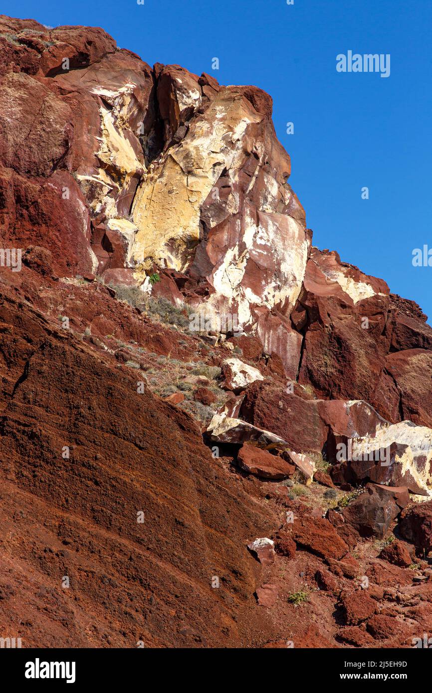 Red rocks texture under blue sky Stock Photo - Alamy