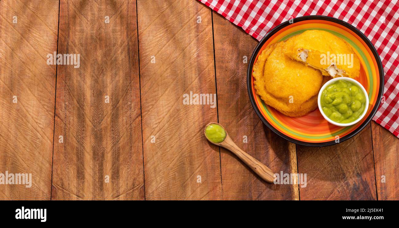 Typical Colombian coastal dish - Fried Egg Arepa Stock Photo - Alamy