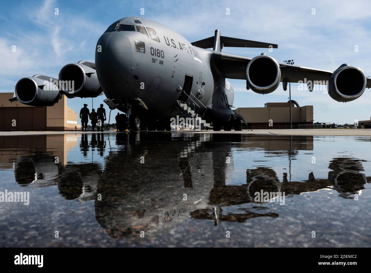 Airmen assigned to the 911th Aircraft Maintenance Squadron conduct a ...