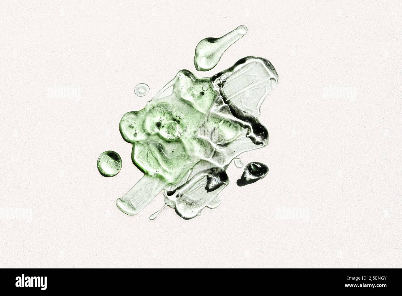 Liquid green gel cosmetic smudge texture. Transparent Gel drops on ...