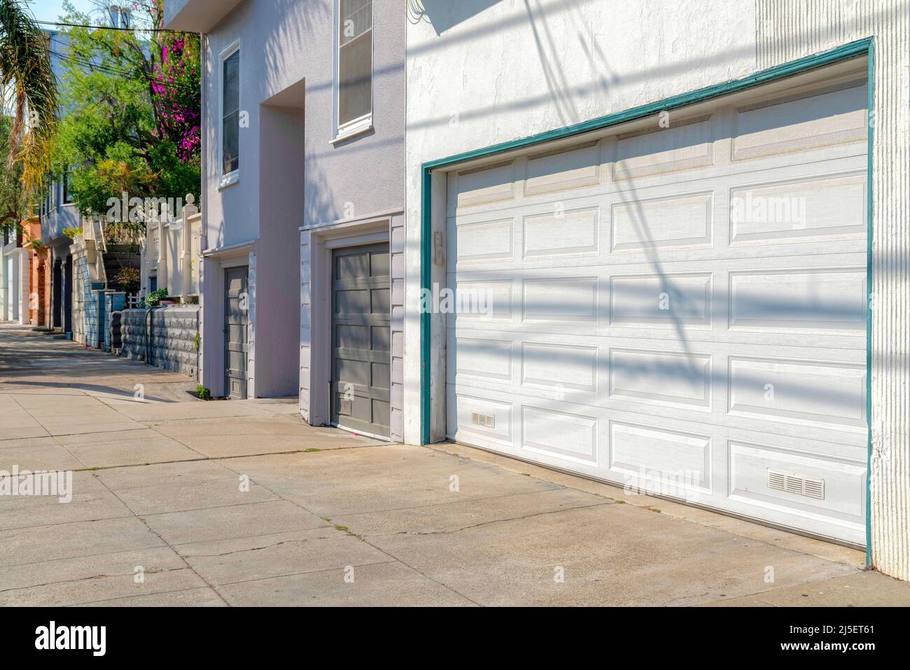 Neighborhood with attached garage and concrete driveways at San ...