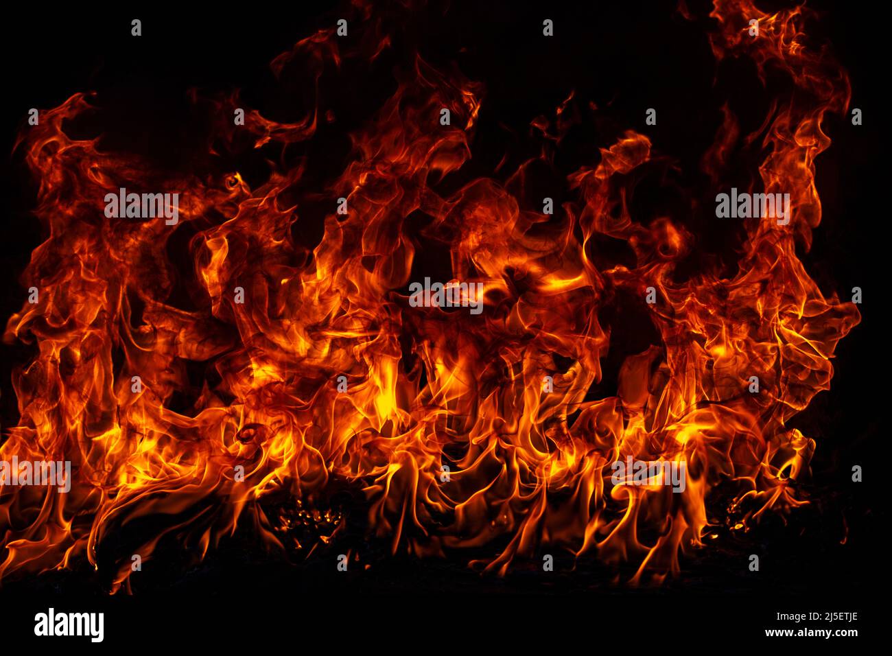 Blaze burning fire flame on art texture background Stock Photo - Alamy