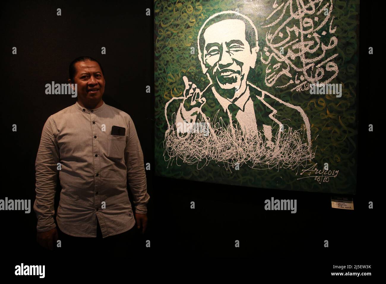 Jakarta, Indonesia. 22nd Apr, 2022. Painter M. Arif Syukur is ...