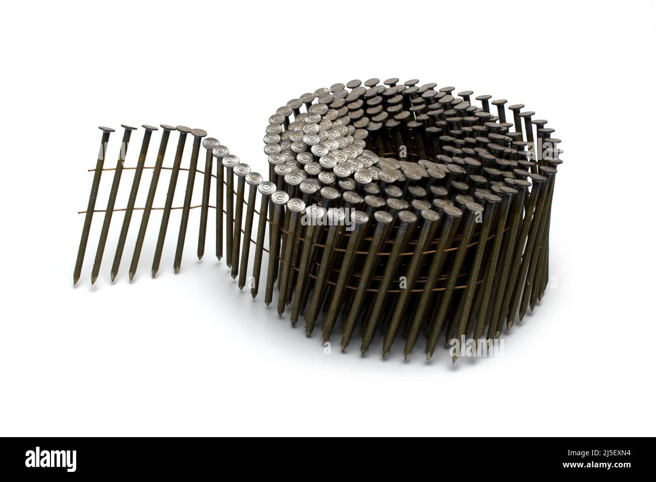 Close up of a roll of special nails in a wire connected row to be used ...