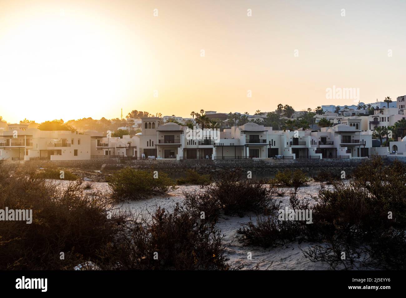 View of the beach and private villas Stock Photo - Alamy