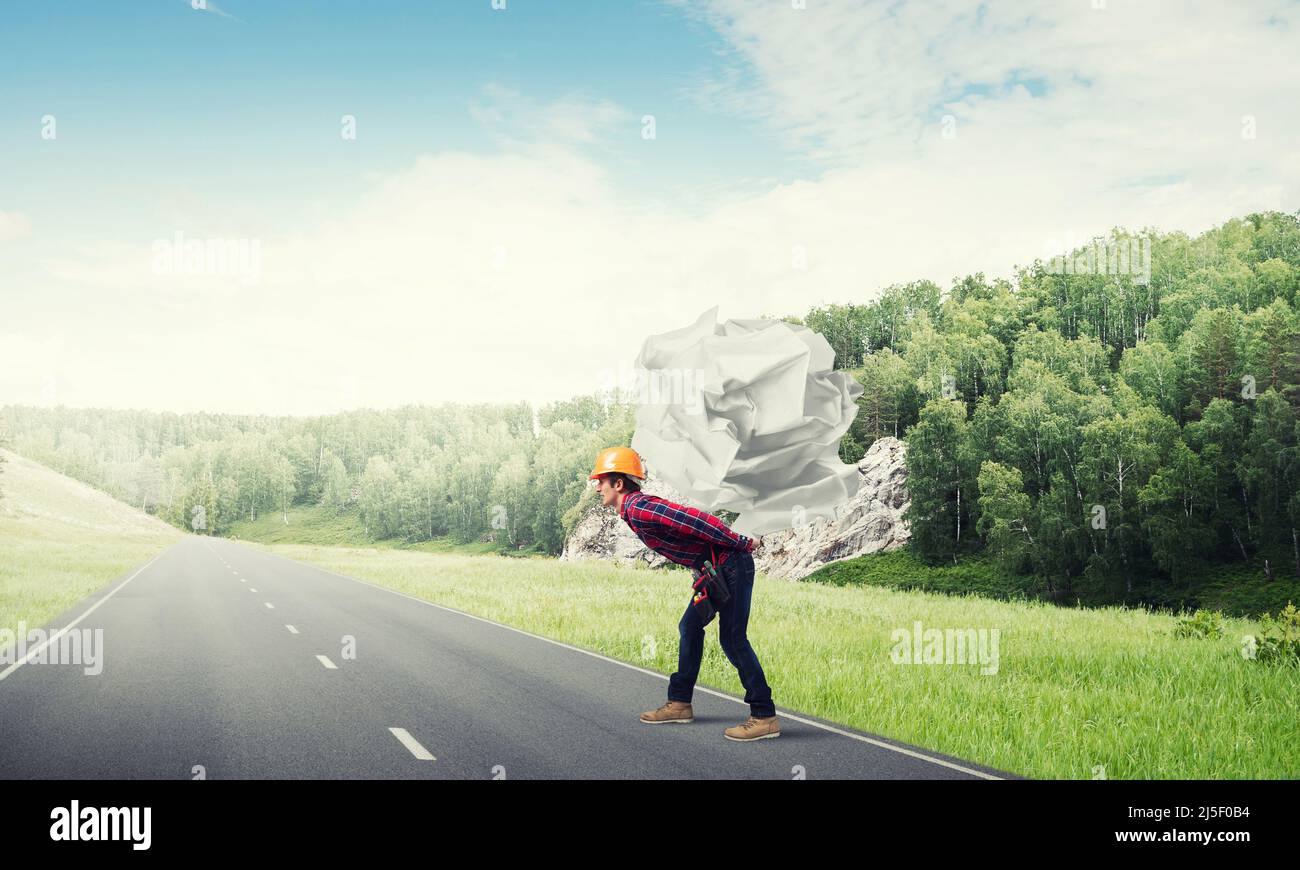 Engineer man carry load Stock Photo - Alamy