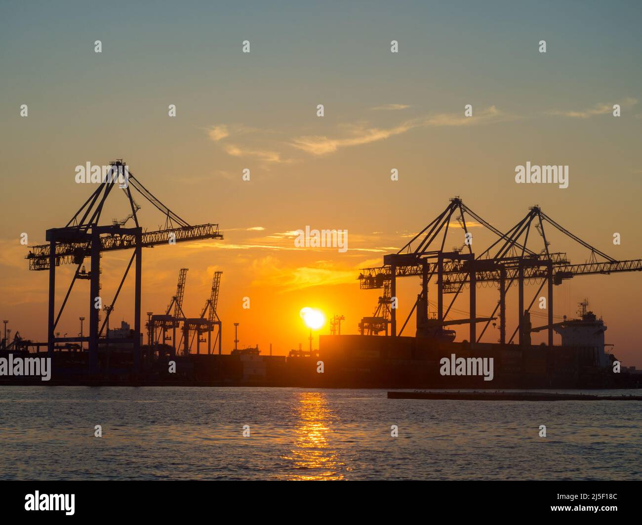 black sea port Odesa, Ukraine with a lot of cranes, cabins, boxes and ...