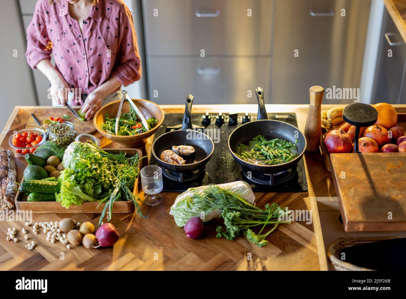 Woman cooking healthy and tasty food at home Stock Photo - Alamy