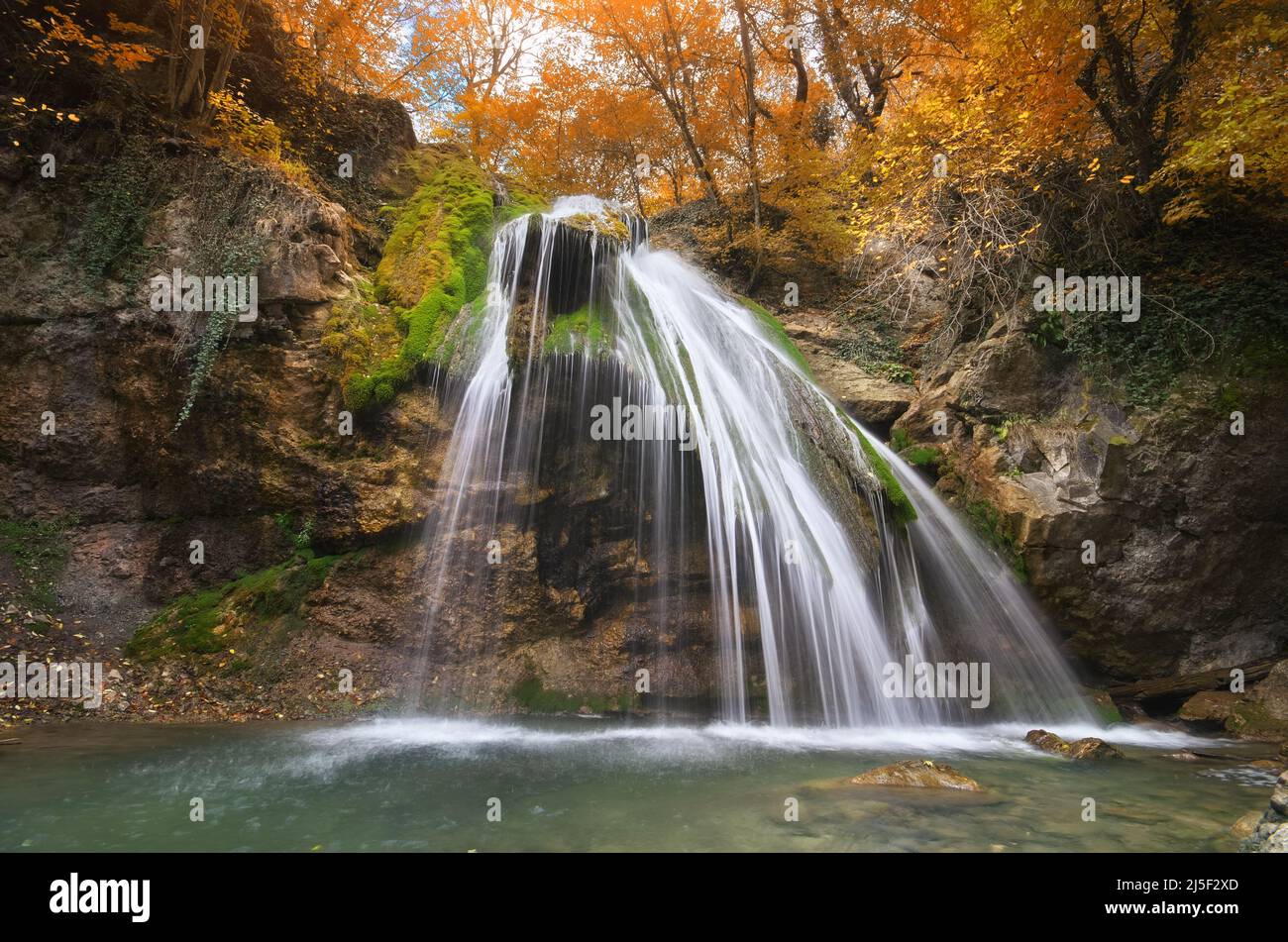 Spring waterfall and rill flow. Nature composition Stock Photo - Alamy