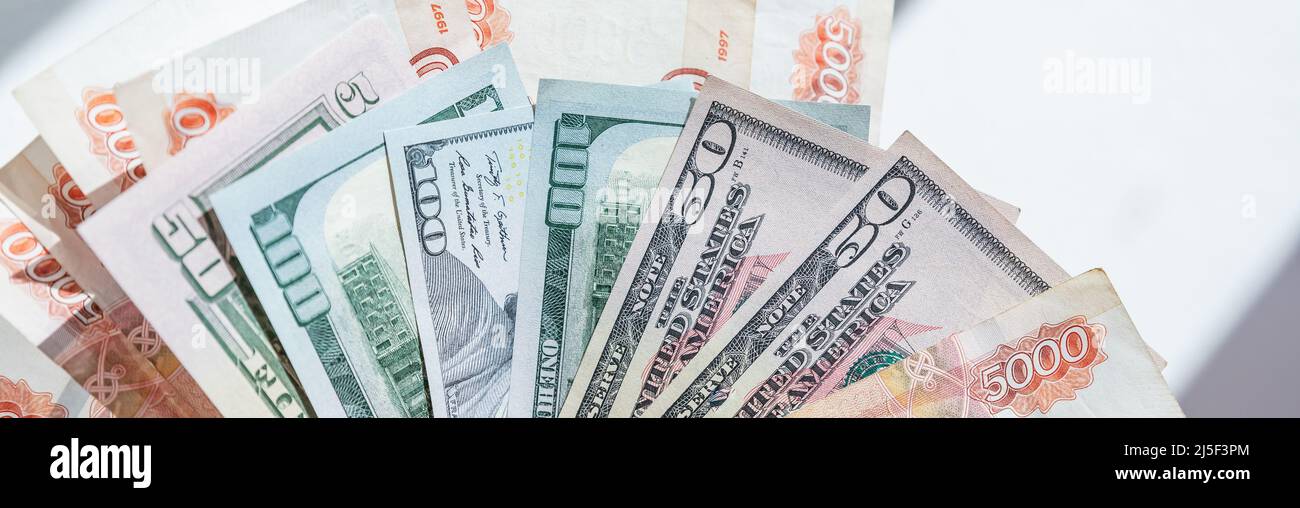 Different money in banknotes of 100 euro, 100 dollars and Russian ruble ...