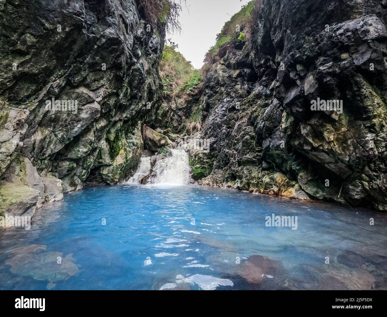 Extremely blue water in a mountain stream, Yangmingshan, Taipei Stock ...
