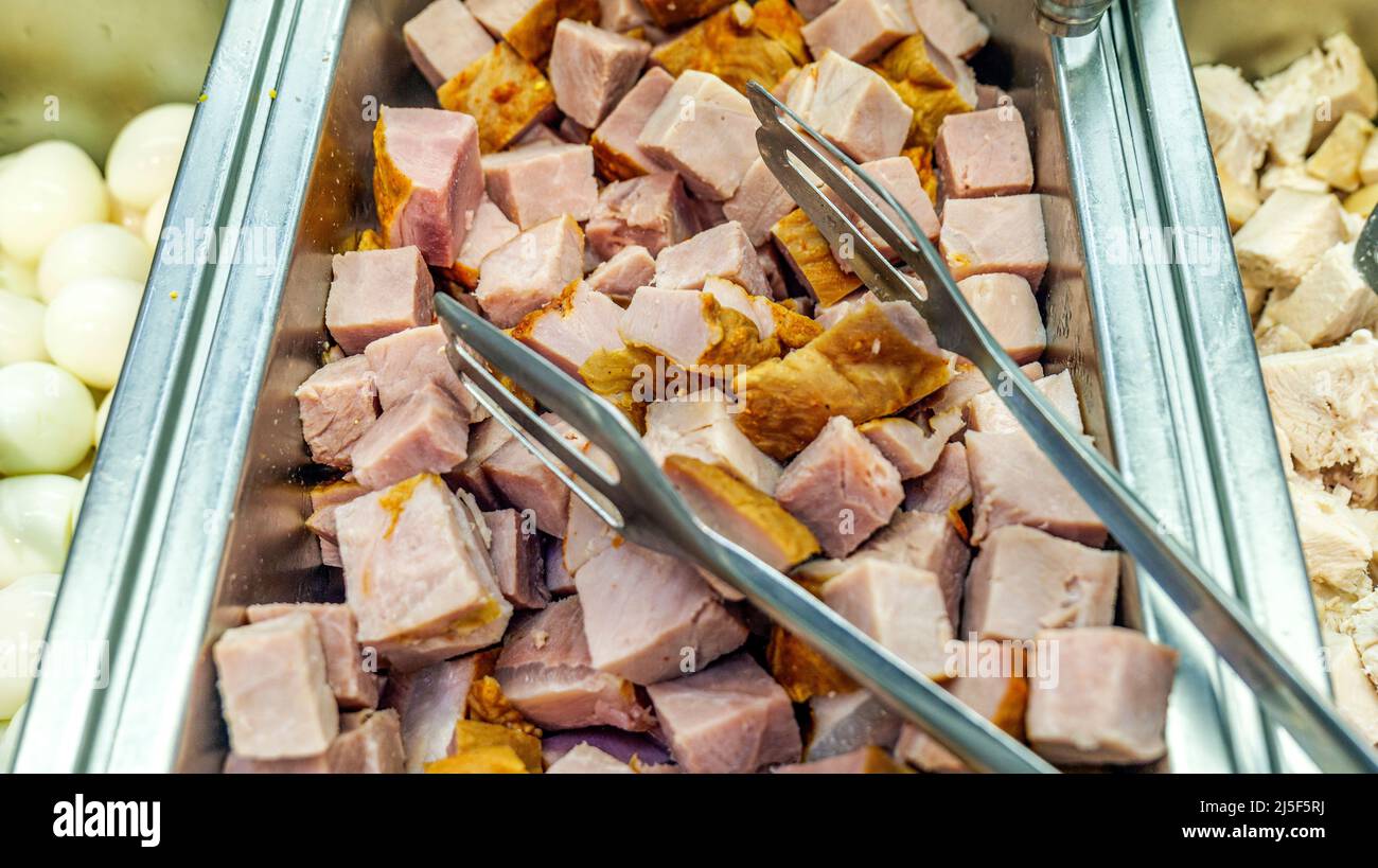 buffet meat close-up. minced meat in squares Stock Photo - Alamy
