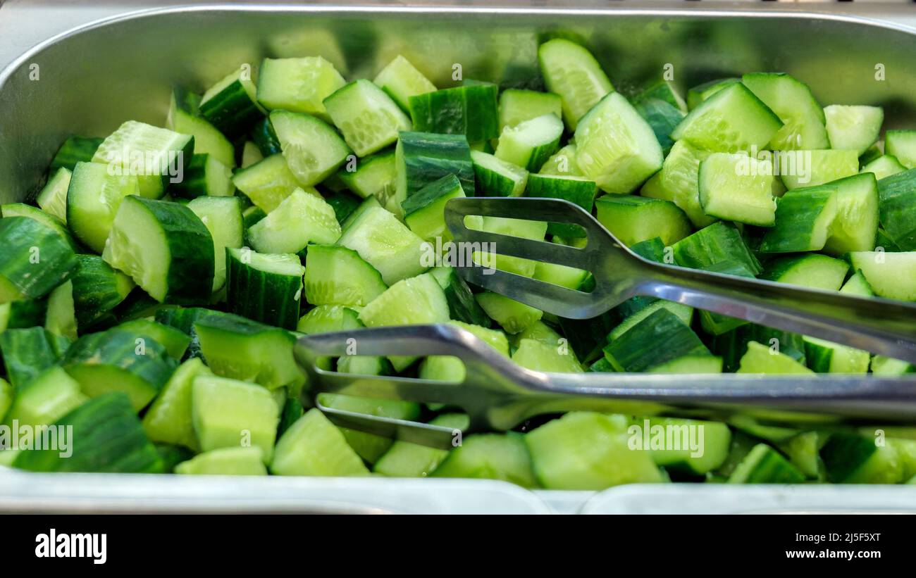 buffet green cucumber slices close-up Stock Photo - Alamy