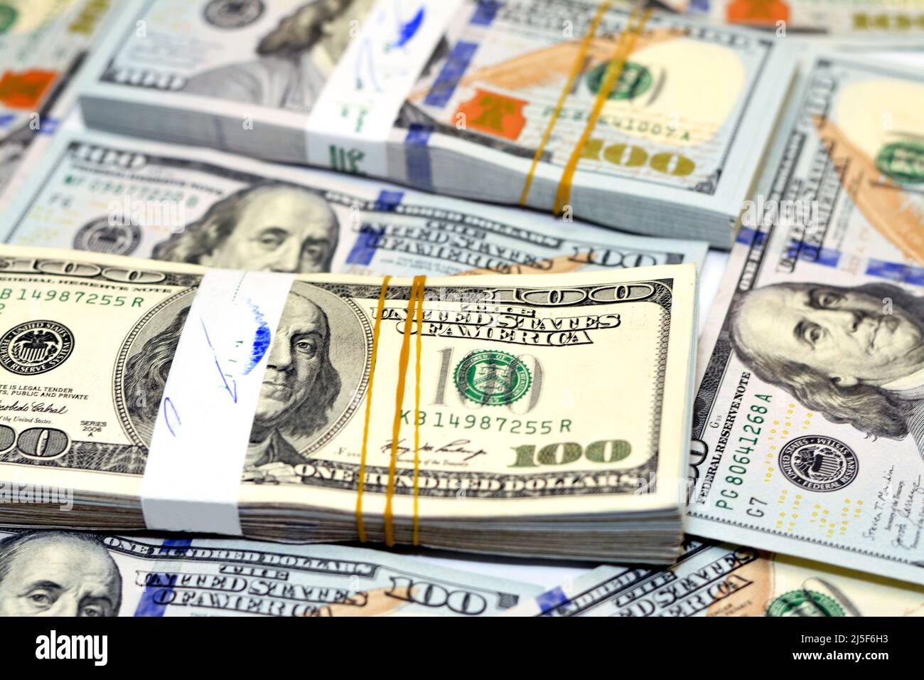 Selective focus of stacks of American money banknote background ...
