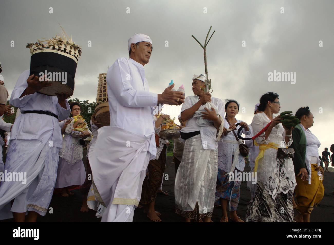 A Balinese clan is getting ready to conduct a religious ritual to ...
