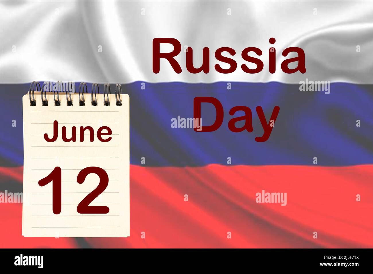 The celebration of the Russia Day with the flag and the calendar ...