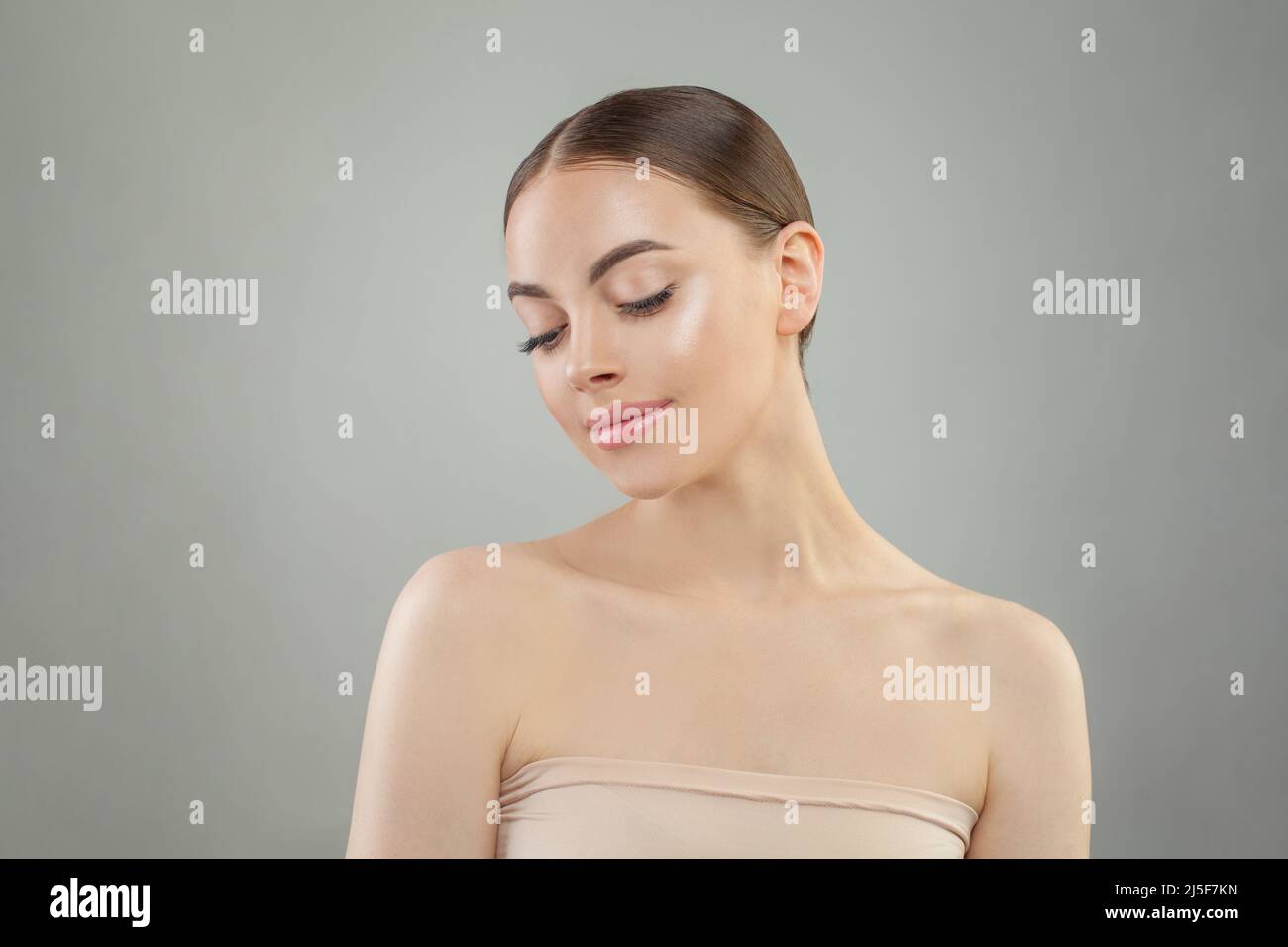 Perfect young woman with fresh shiny clean skin, studio portrait ...