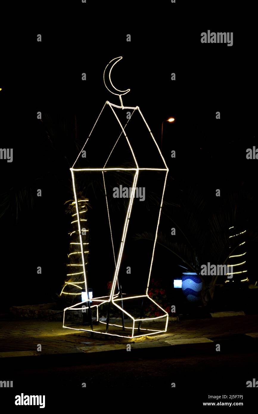 An Islamic Ramadan lantern made with led lights in the street as a ...