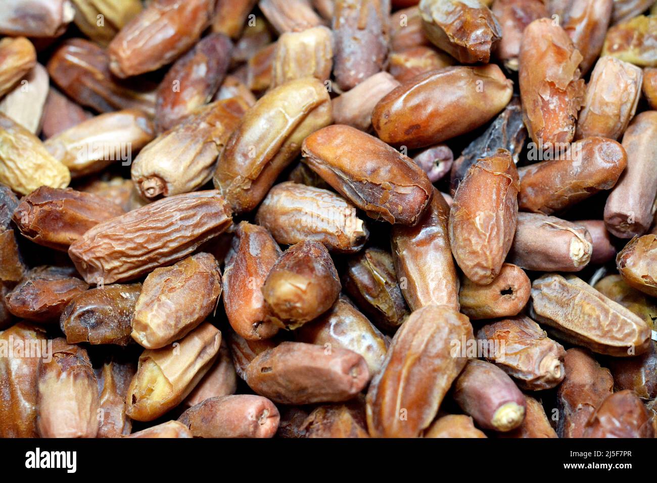 Stack of Dried dates fruit that is used as the main composition of ...