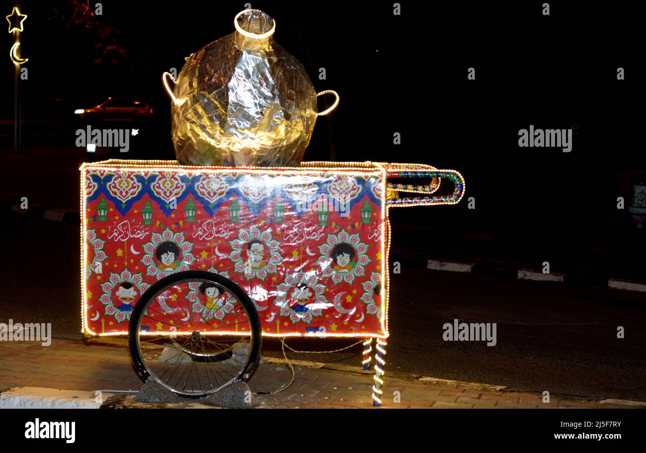 Cairo, Egypt, March 25 2022: Ramadan decorative fava beans cart with ...