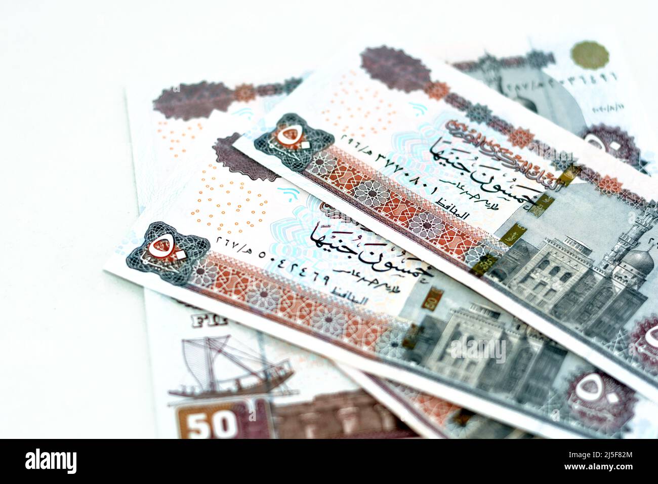 A pile of Egyptian money banknotes of 50 LE fifty pounds features Abu ...